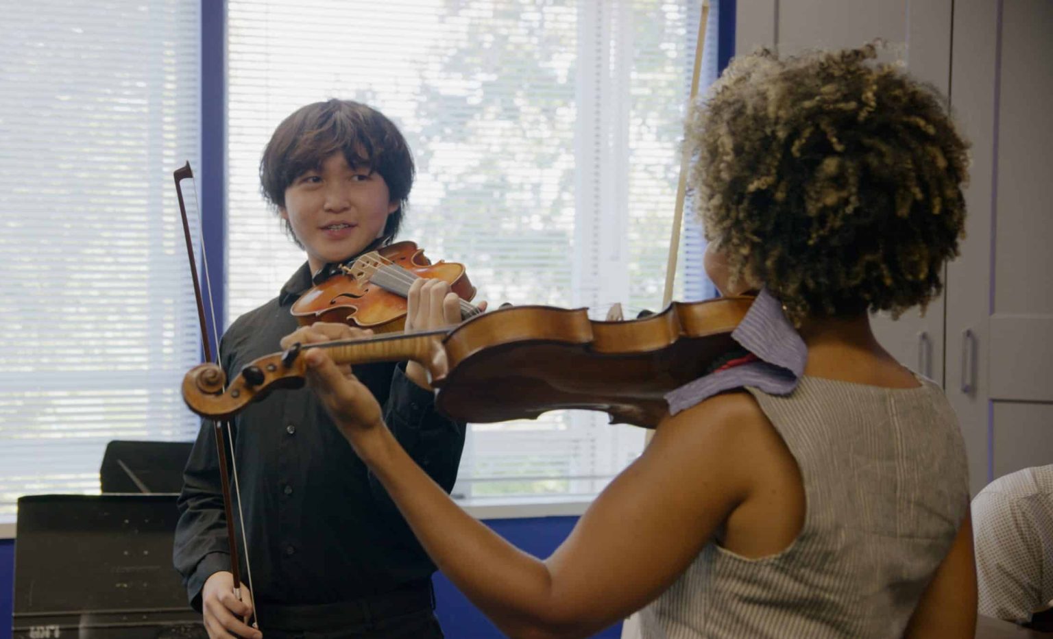 Award-winning violinist Melissa White visits students for a special ...